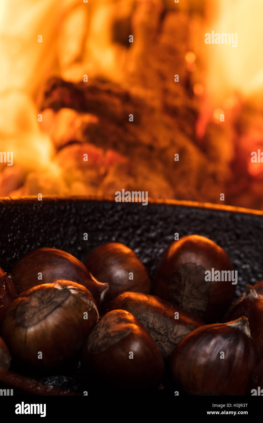 Chestnuts Roasting on a Wood Fire Stock Photo - Alamy