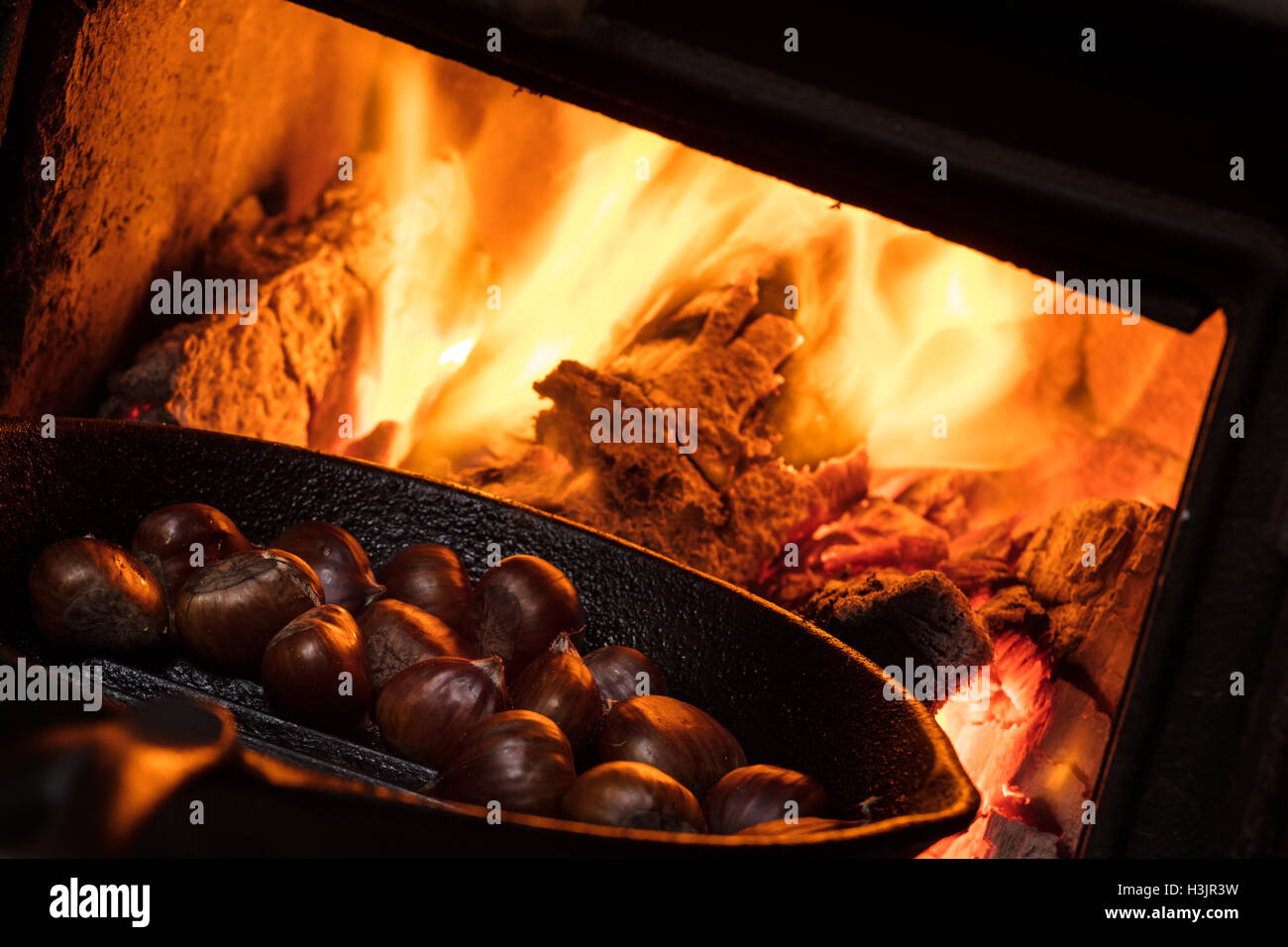 Wood fire roasting hi-res stock photography and images - Alamy