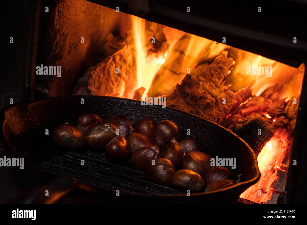 Chestnuts Roasting on a Wood Fire Stock Photo - Alamy