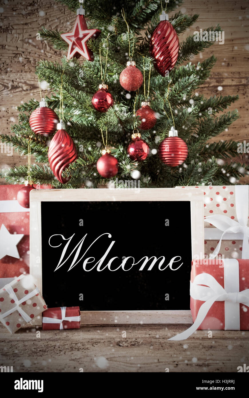 Nostalgic Christmas Tree With Welcome Stock Photo - Alamy