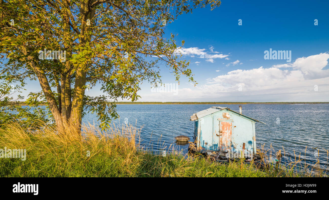 Traditional Fishing European Hut in sea lagoon Stock Photo - Alamy