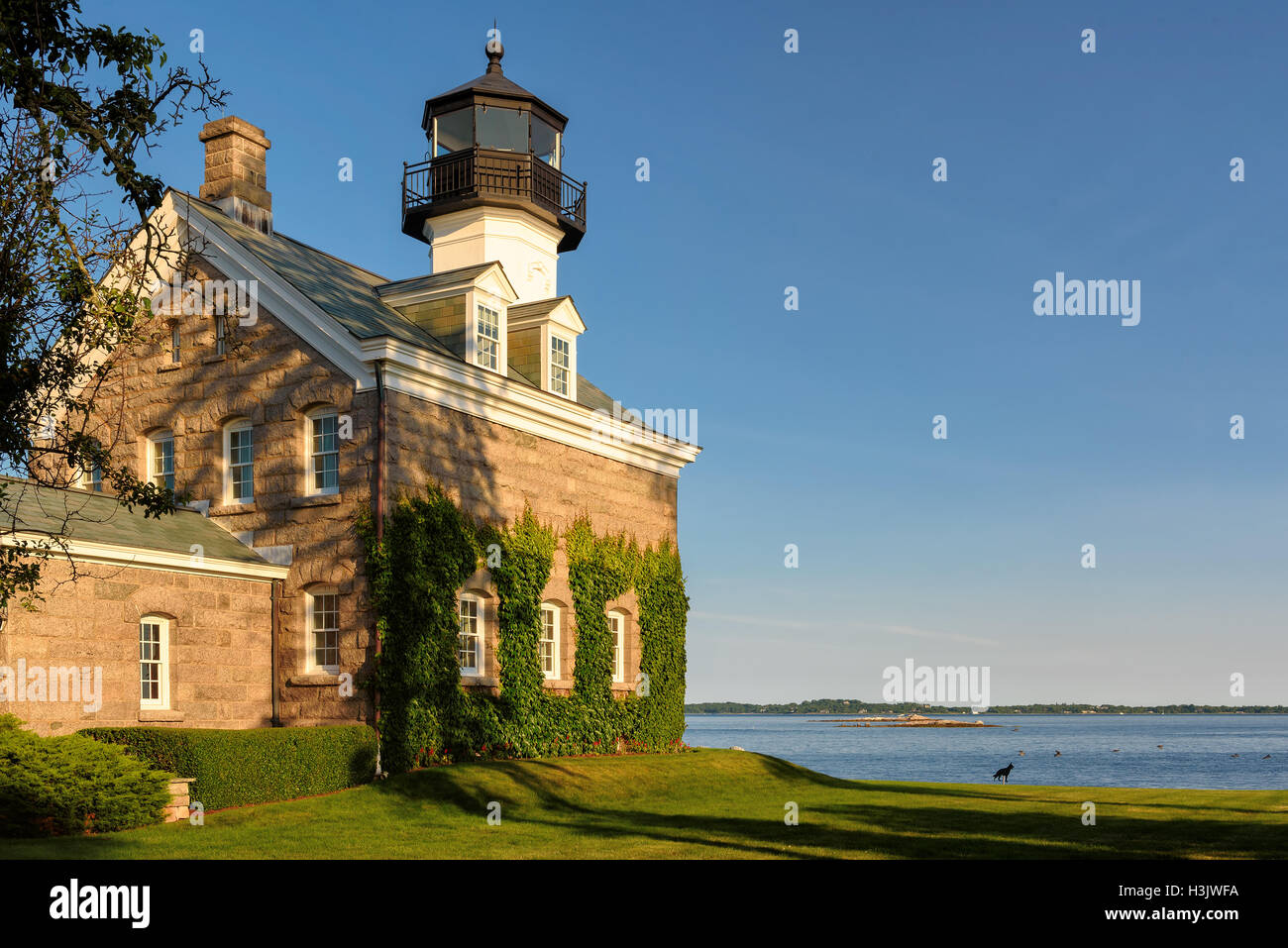Morgan Point Lighthouse on Atlantic coast at sunset, Noank, Connecticut ...