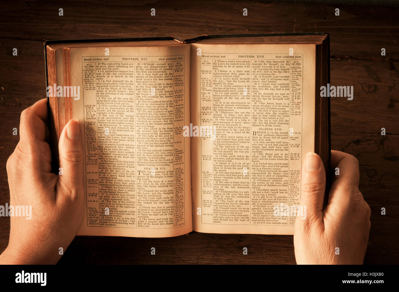 reading the Holy Bible Stock Photo - Alamy