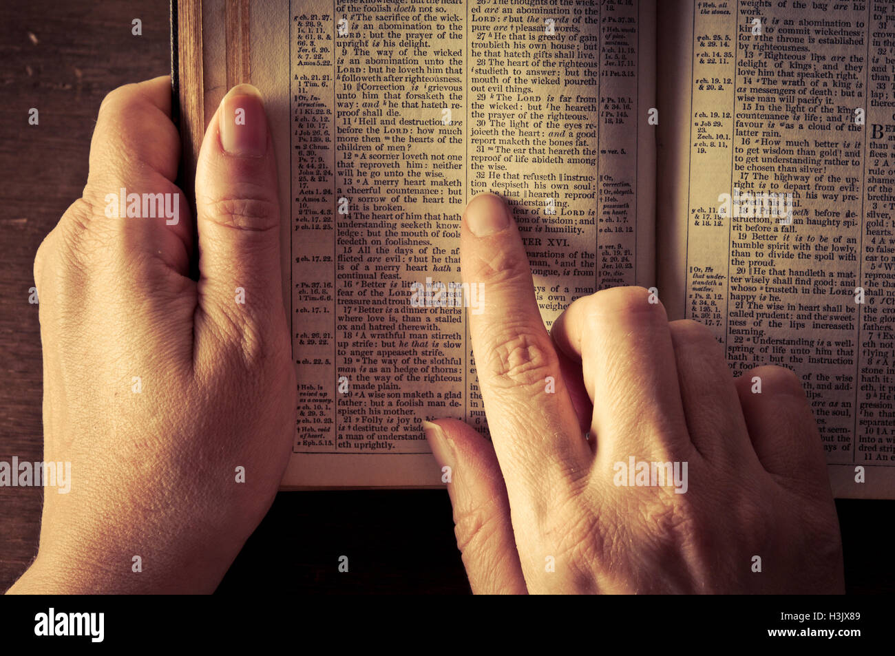 reading the Holy Bible Stock Photo - Alamy