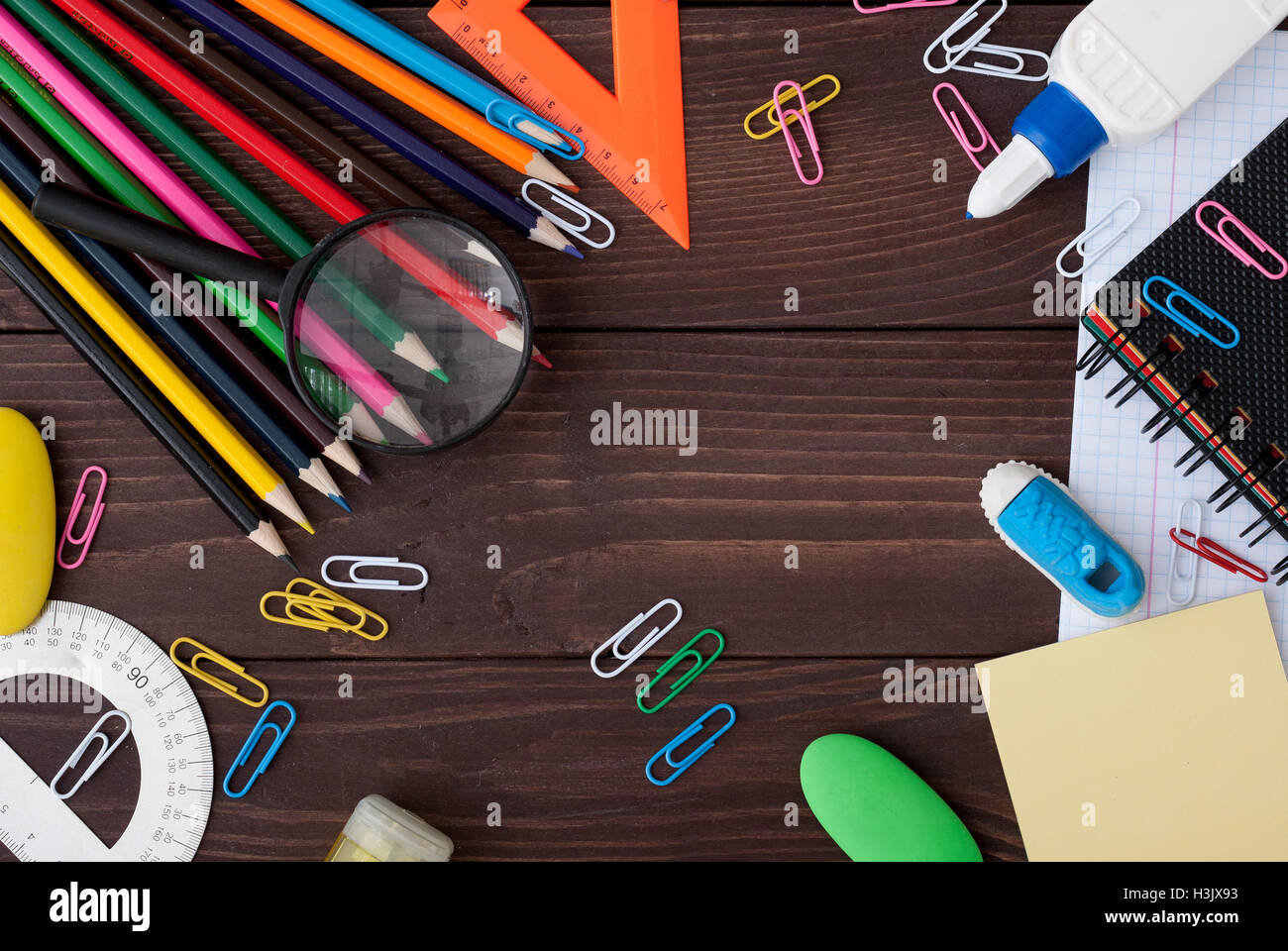 School supplies on a wooden table Stock Photo - Alamy
