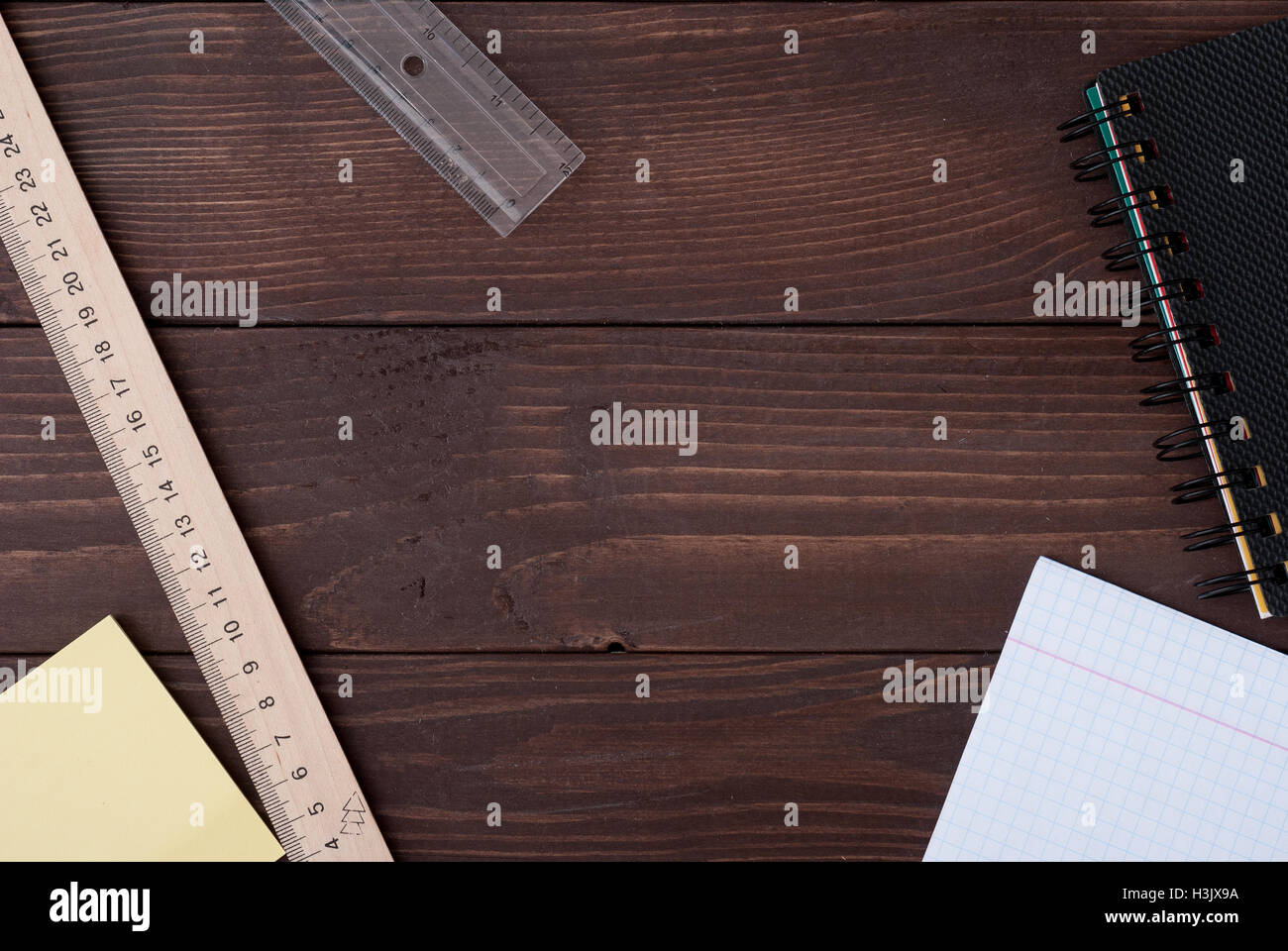 School supplies on a wooden table Stock Photo - Alamy