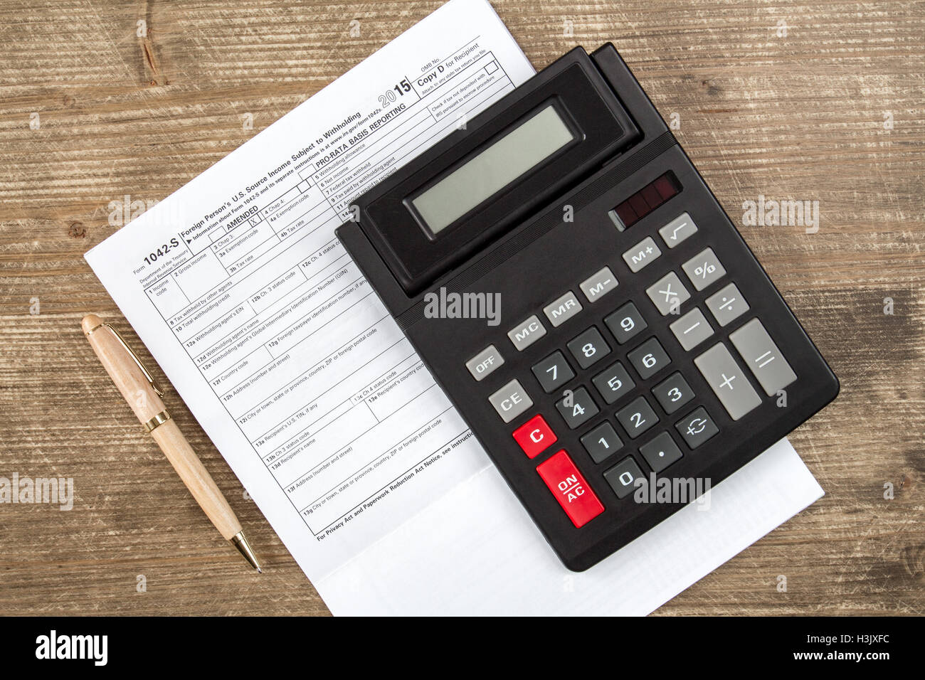 Calculator and tax form which confirms the payment of the tax in the ...