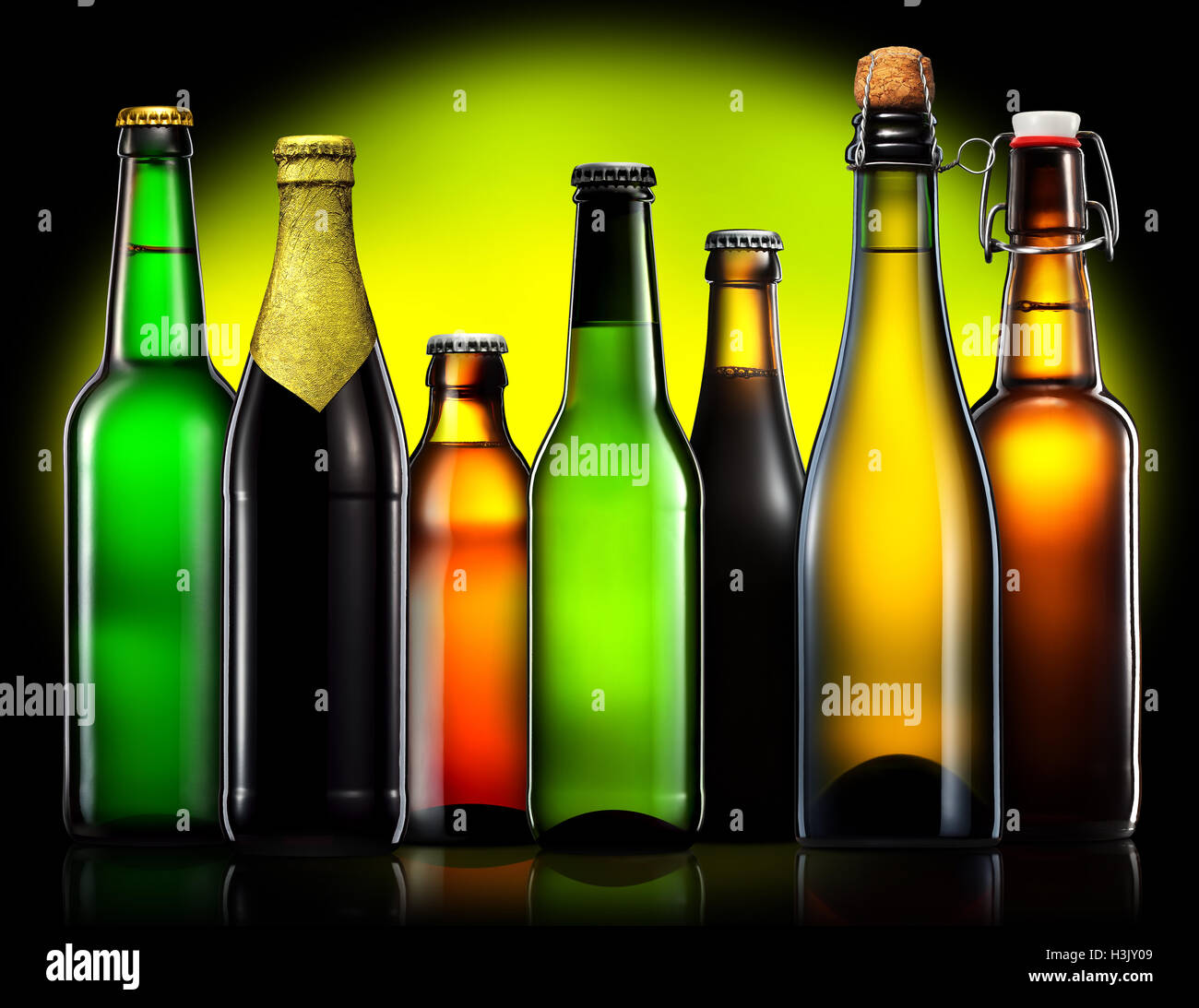 Set of beer bottles isolated on black background Stock Photo - Alamy