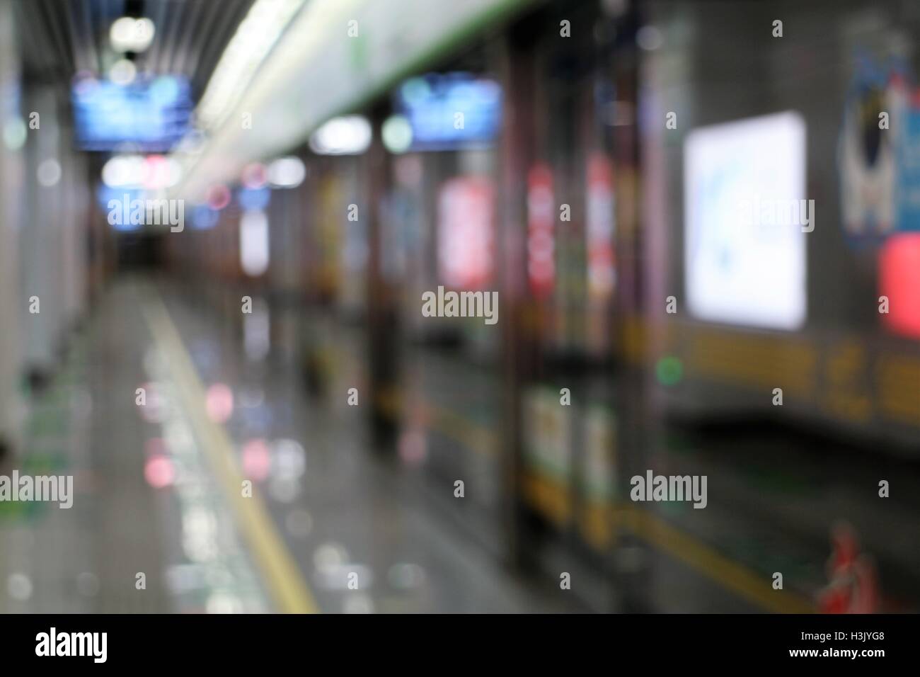 Defocused subway station platform scene Stock Photo - Alamy