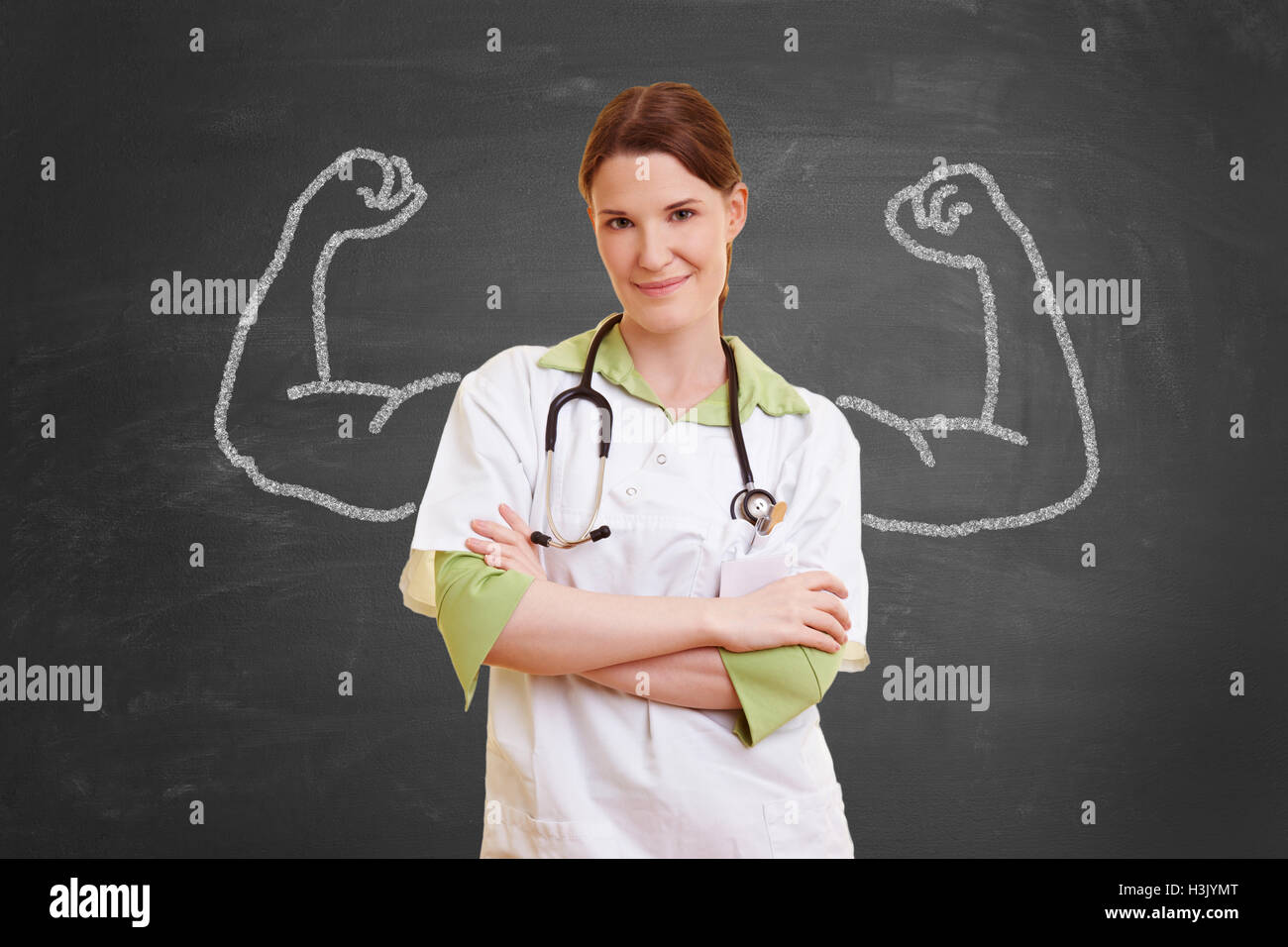 Self confident nurse woman with chalk muscles Stock Photo - Alamy