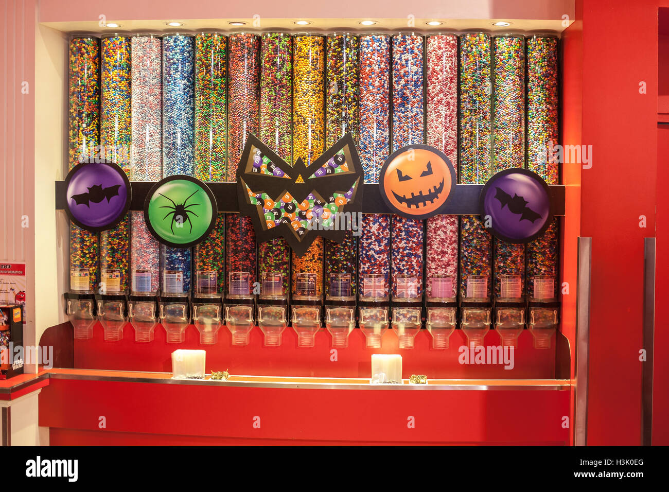 colorful M&M crispy candy assortments inside the cylinder shaped glass ...