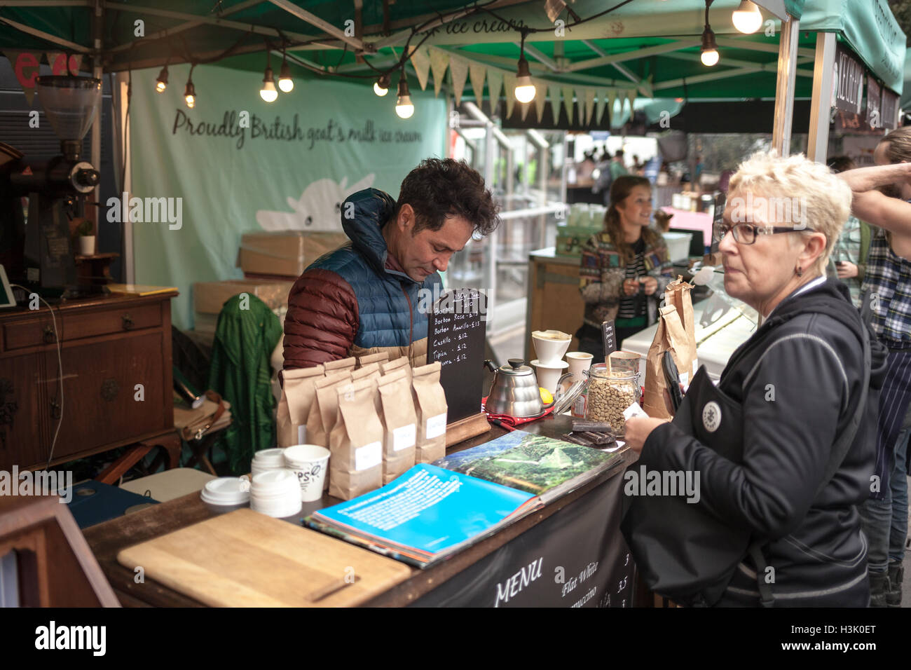 woman in Borough market in London buying Colombian coffee Stock Photo ...