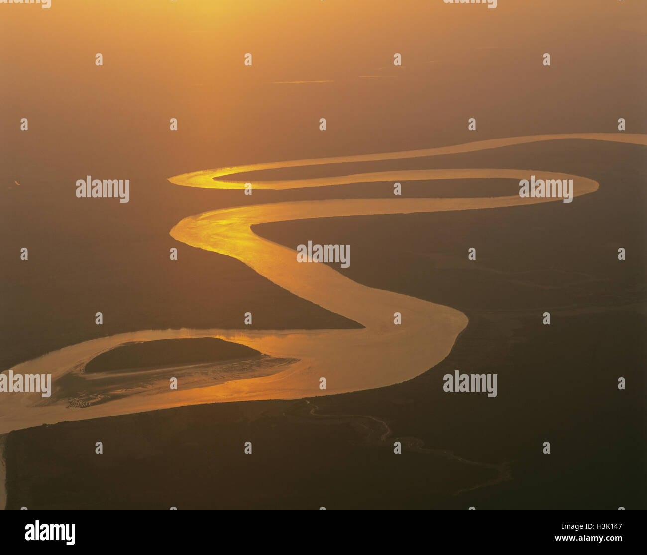 Alligator River meanders at sunset Stock Photo - Alamy