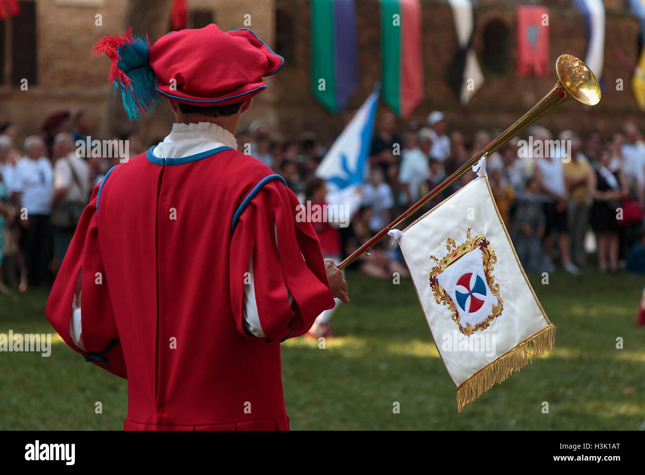 Performer Dressed in Red with Long Trumpet during Procession during ...