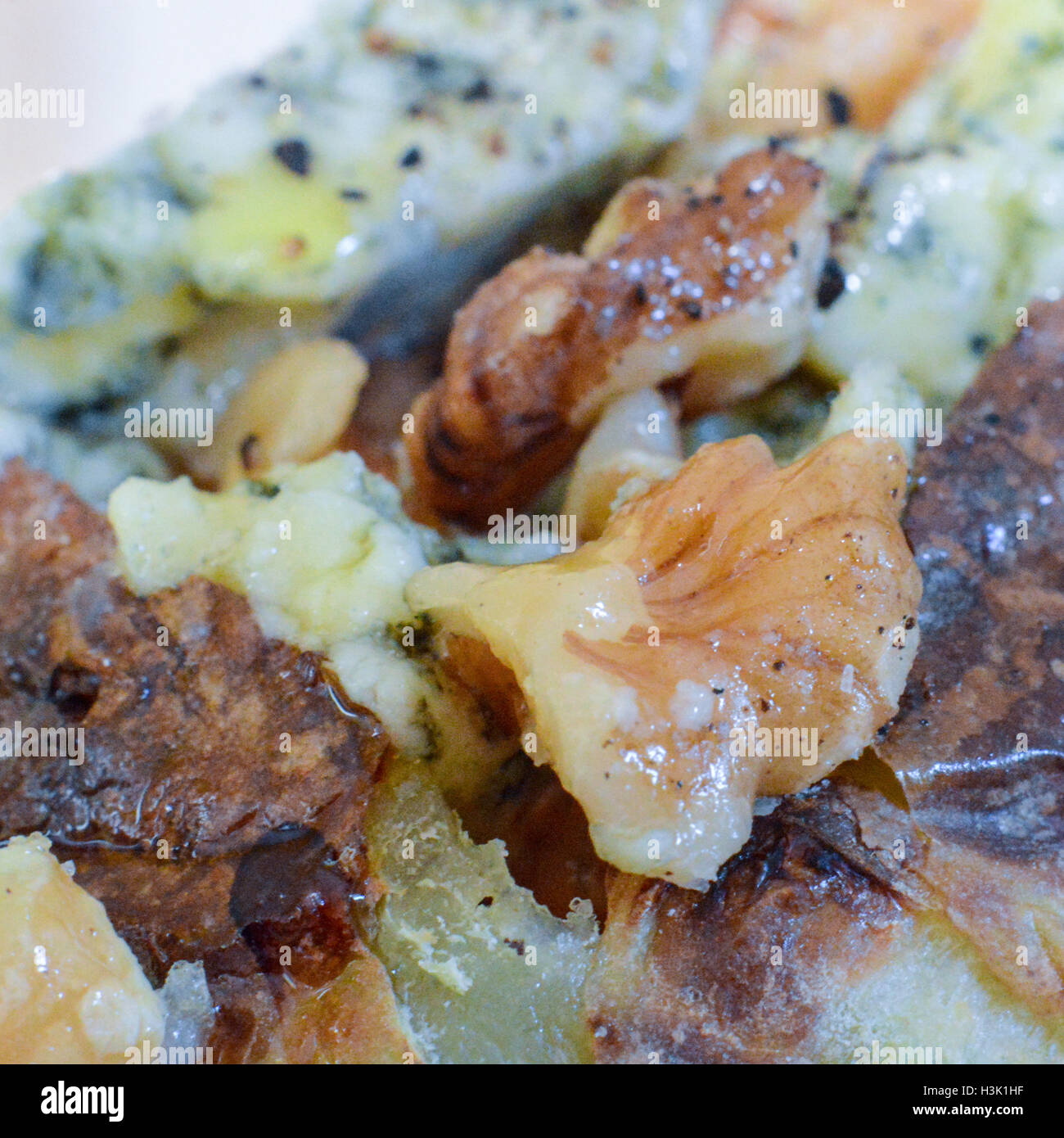Walnut and blue vein cheese on a jacket potato Stock Photo - Alamy
