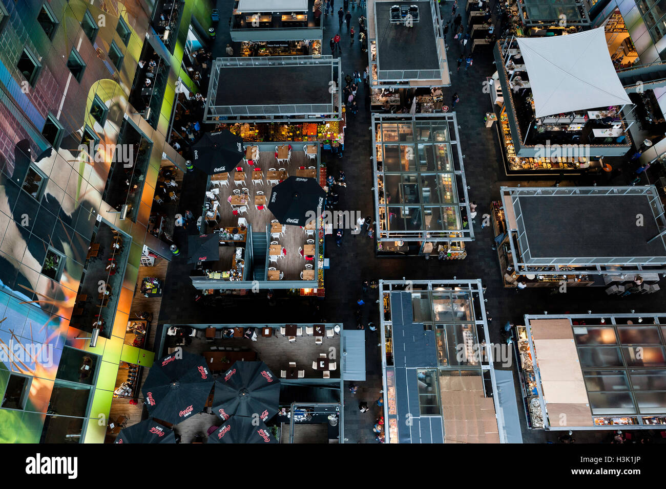 Bird's eye view into market hall with stalls and customers. Market Hall ...