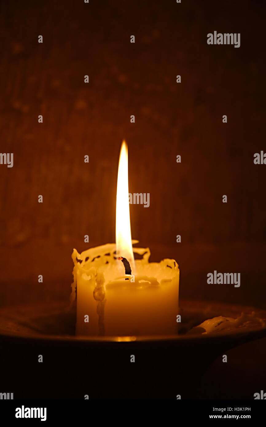 Candle on Fire Stock Photo - Alamy