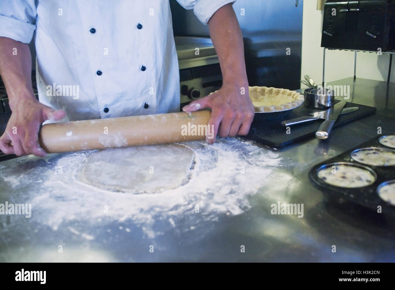 Chef baking pie in kitchen Stock Photo - Alamy
