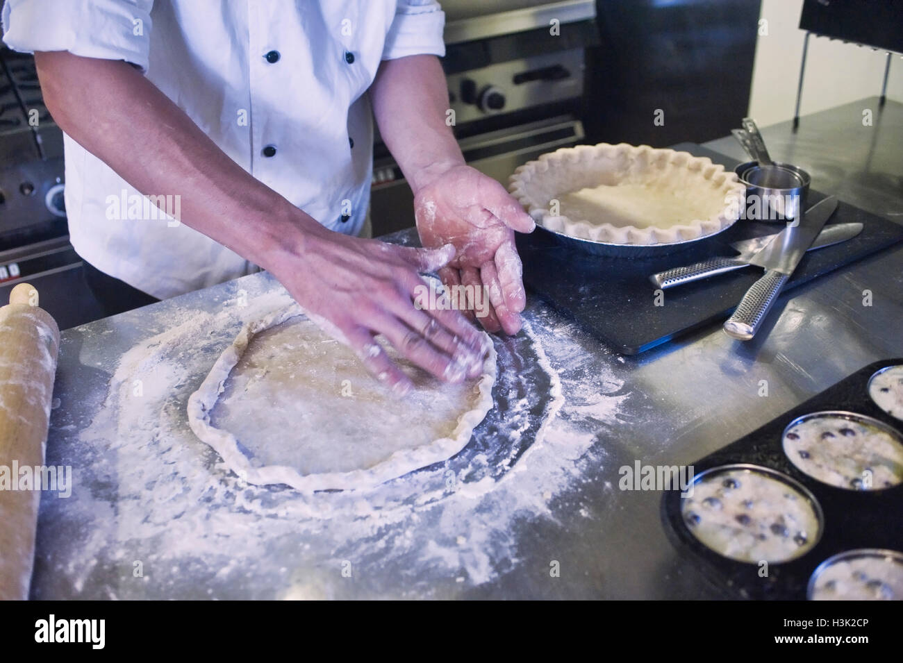 Chef baking pie in kitchen Stock Photo - Alamy
