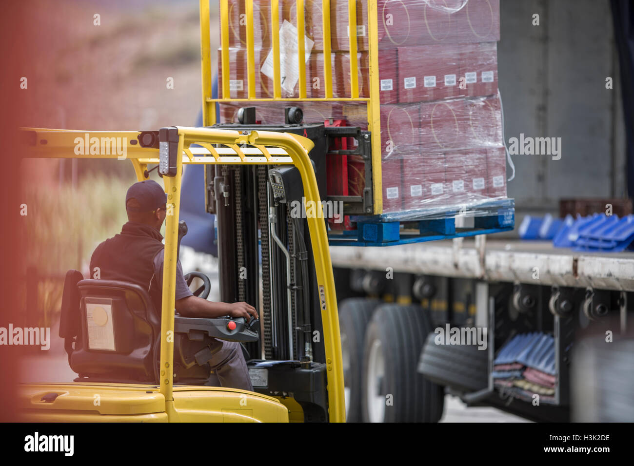 Forklift driver loading pallet onto hi-res stock photography and images ...