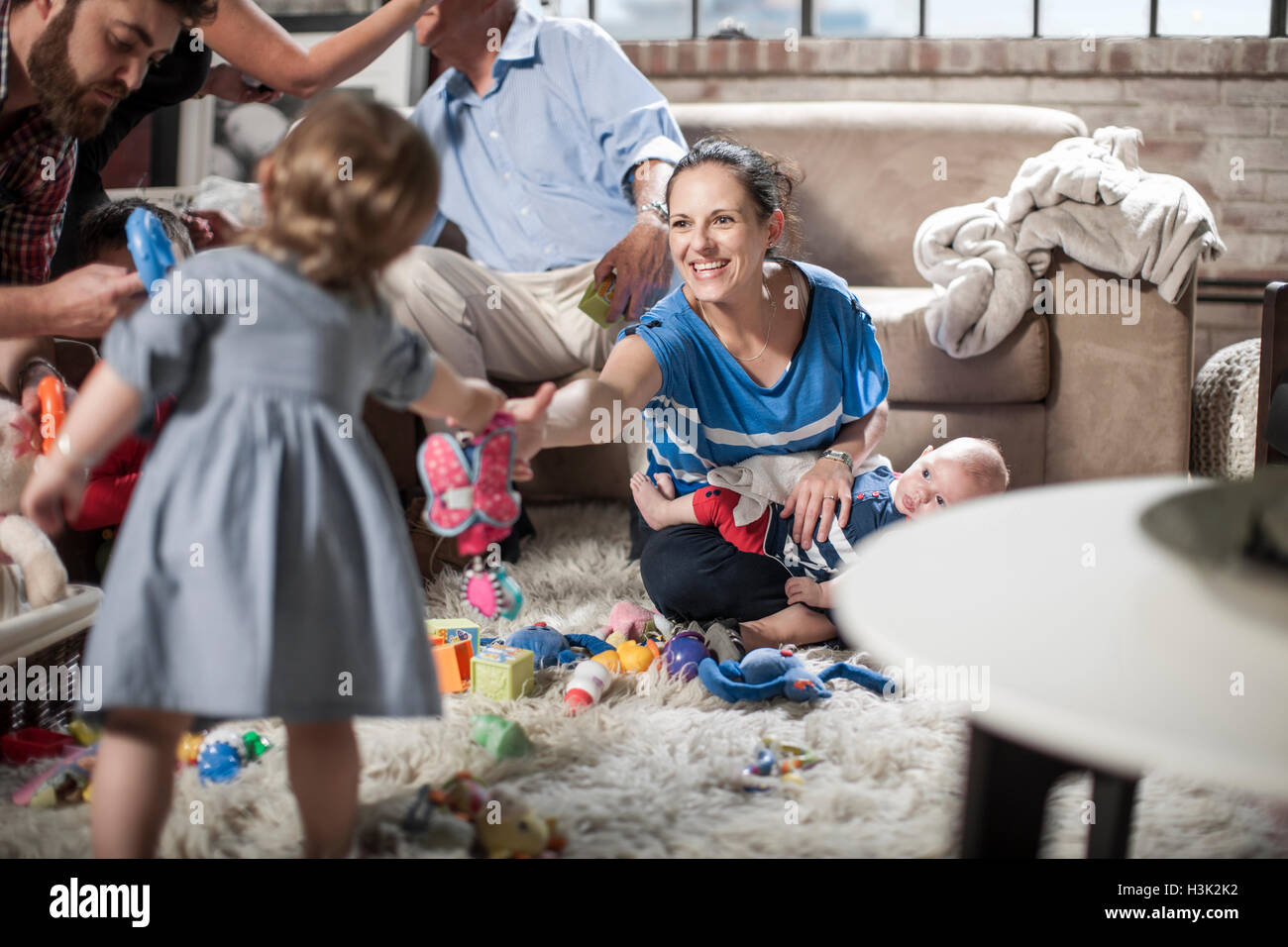 Children playing out with parents hi-res stock photography and images ...