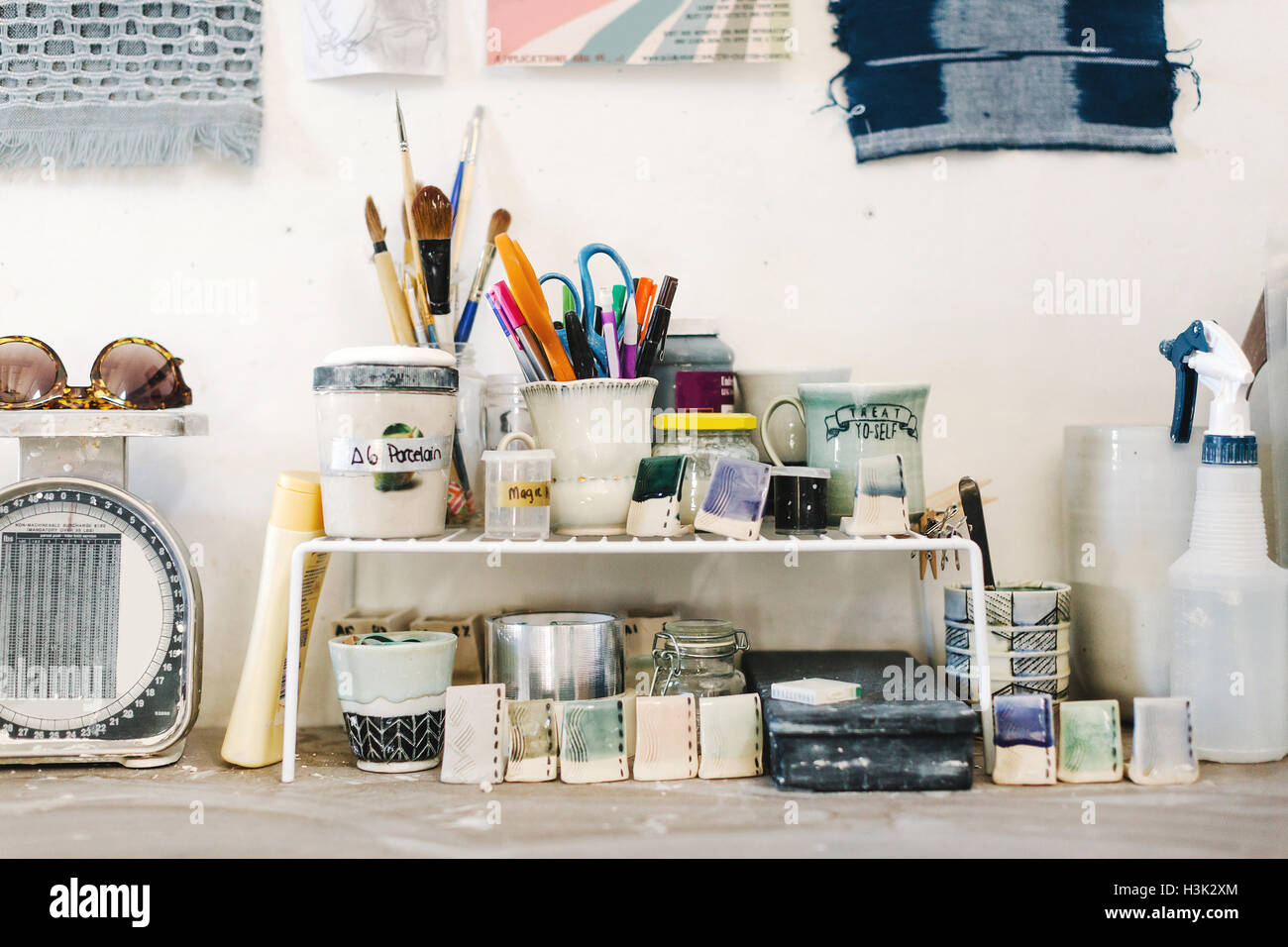 Assortment of art materials and tools in pottery studio Stock Photo - Alamy
