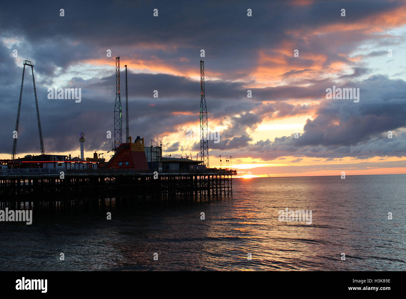 South Pier, Blackpool, Lancashire, UK. 9th October 2016. Sunset ...