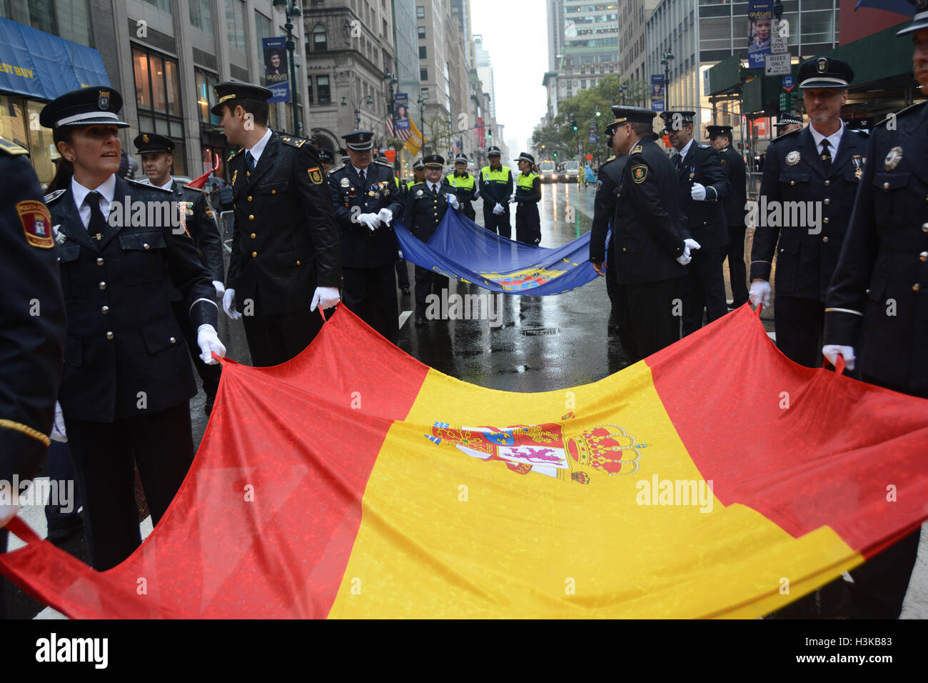 New York, USA. 09th Oct, 2016. Spanish police holding their nation's ...