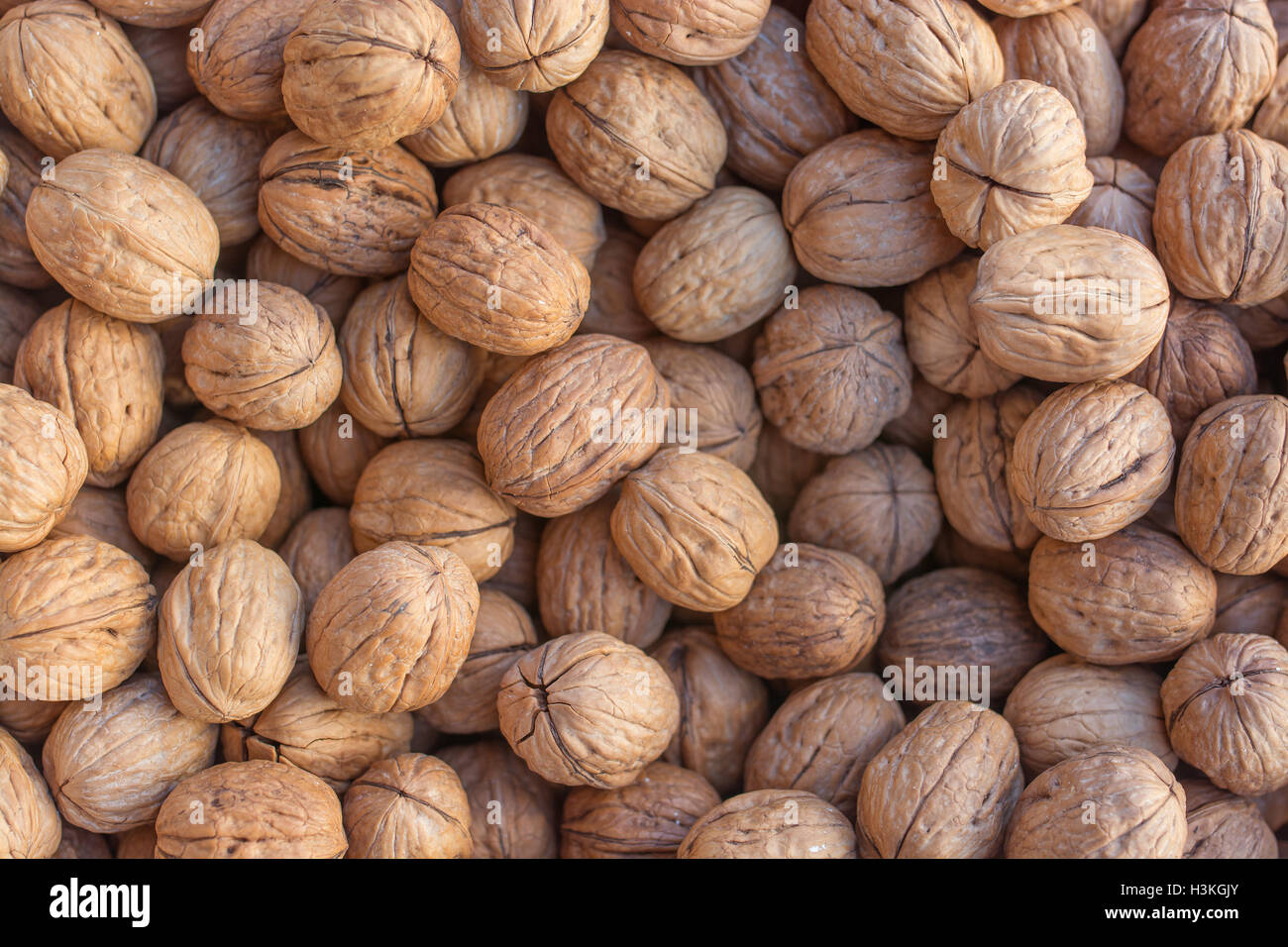 Walnuts. Background of walnuts Stock Photo - Alamy
