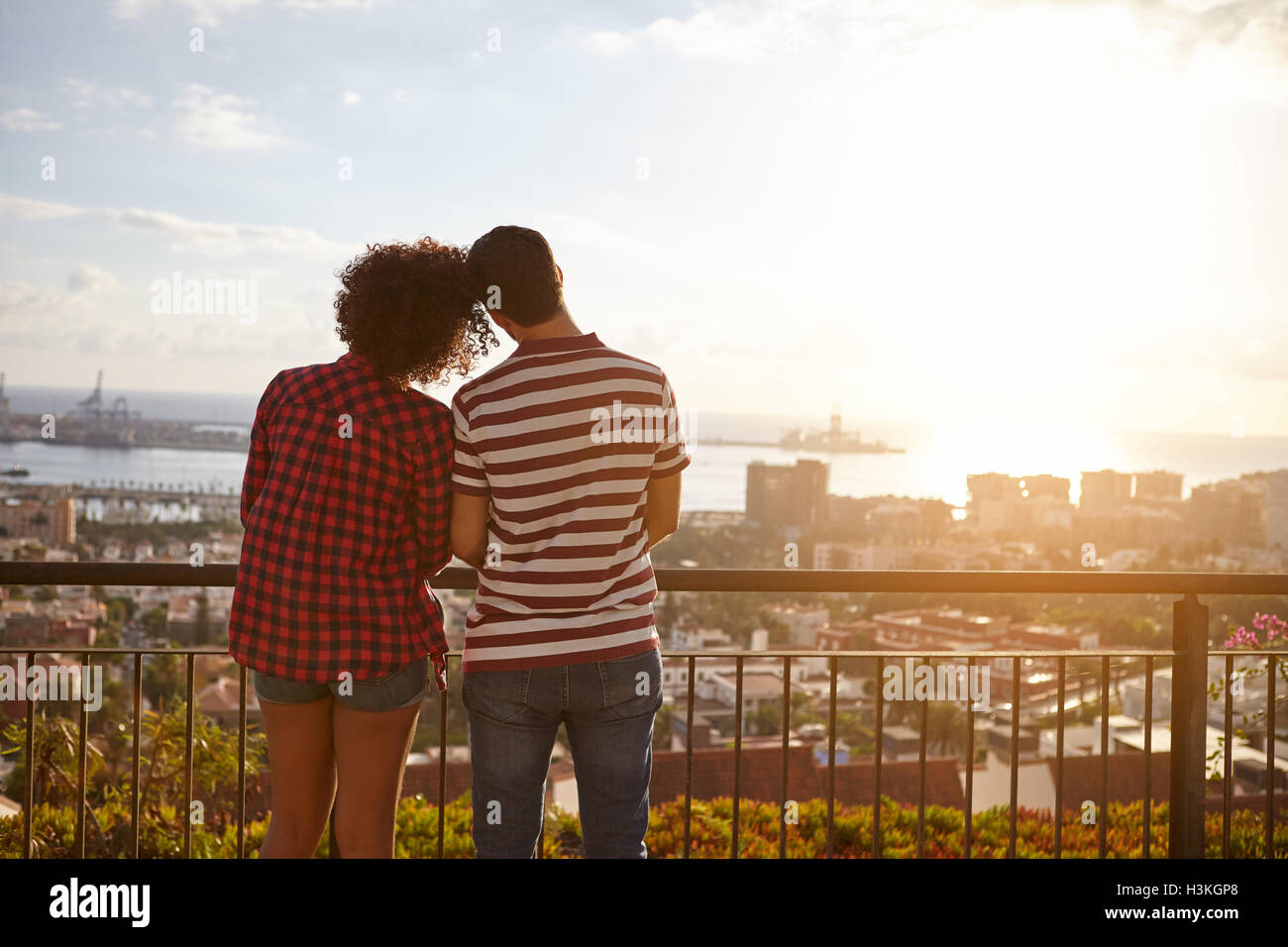 Couple looking over a bridge hi-res stock photography and images - Alamy