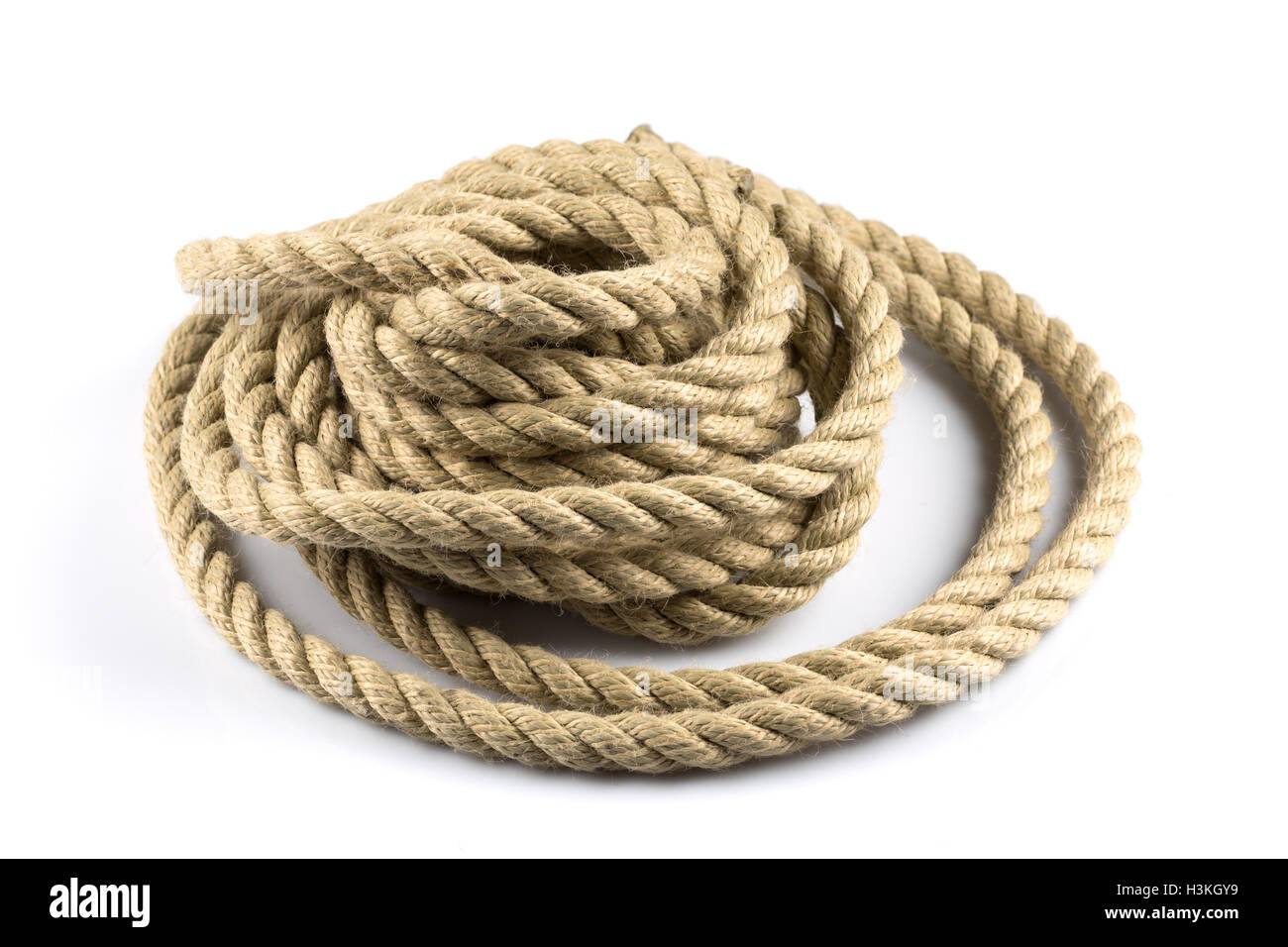 Twisted thick rope isolated on white background Stock Photo - Alamy