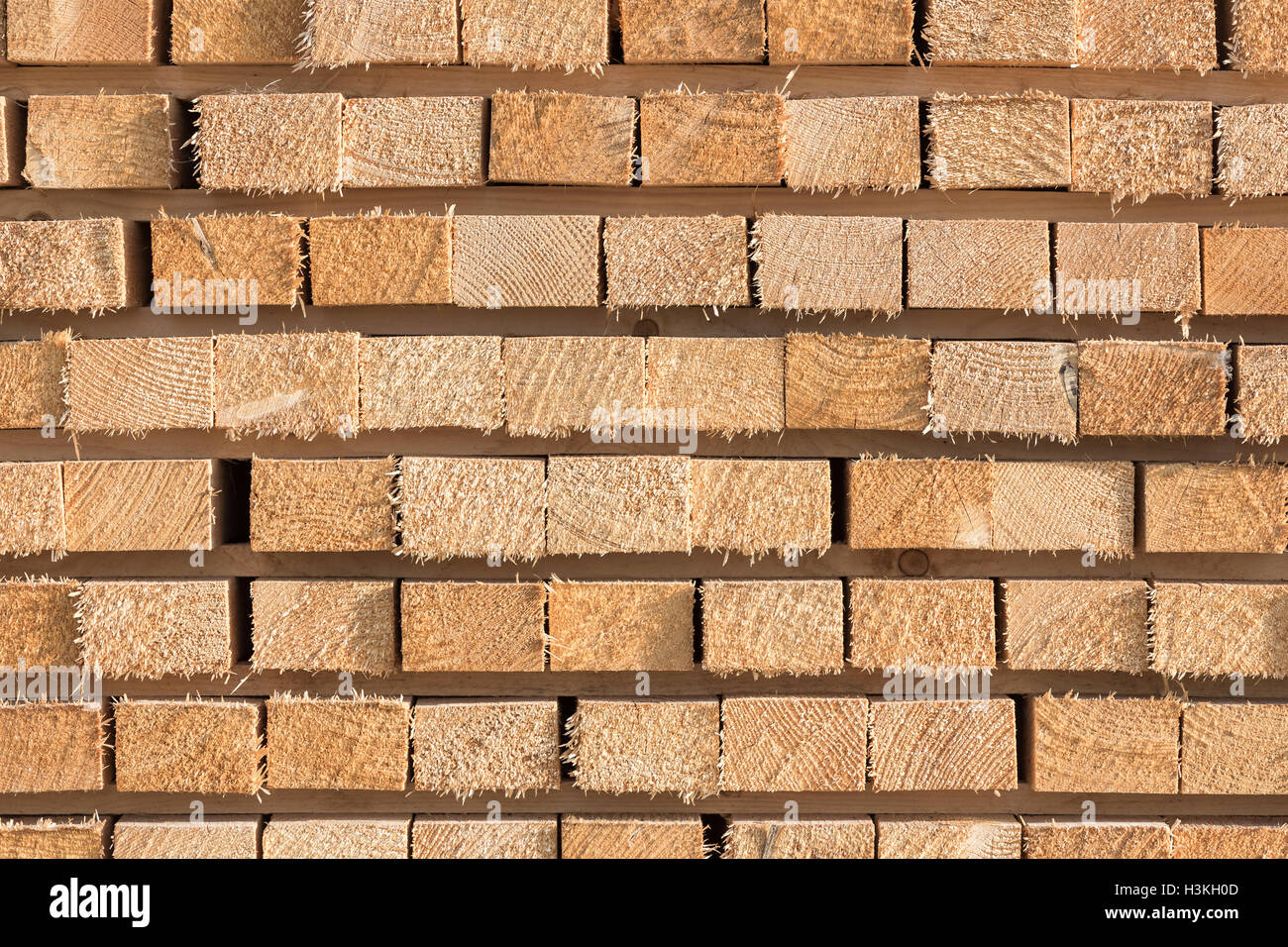 Stack of new wooden studs at the lumber yard Stock Photo - Alamy