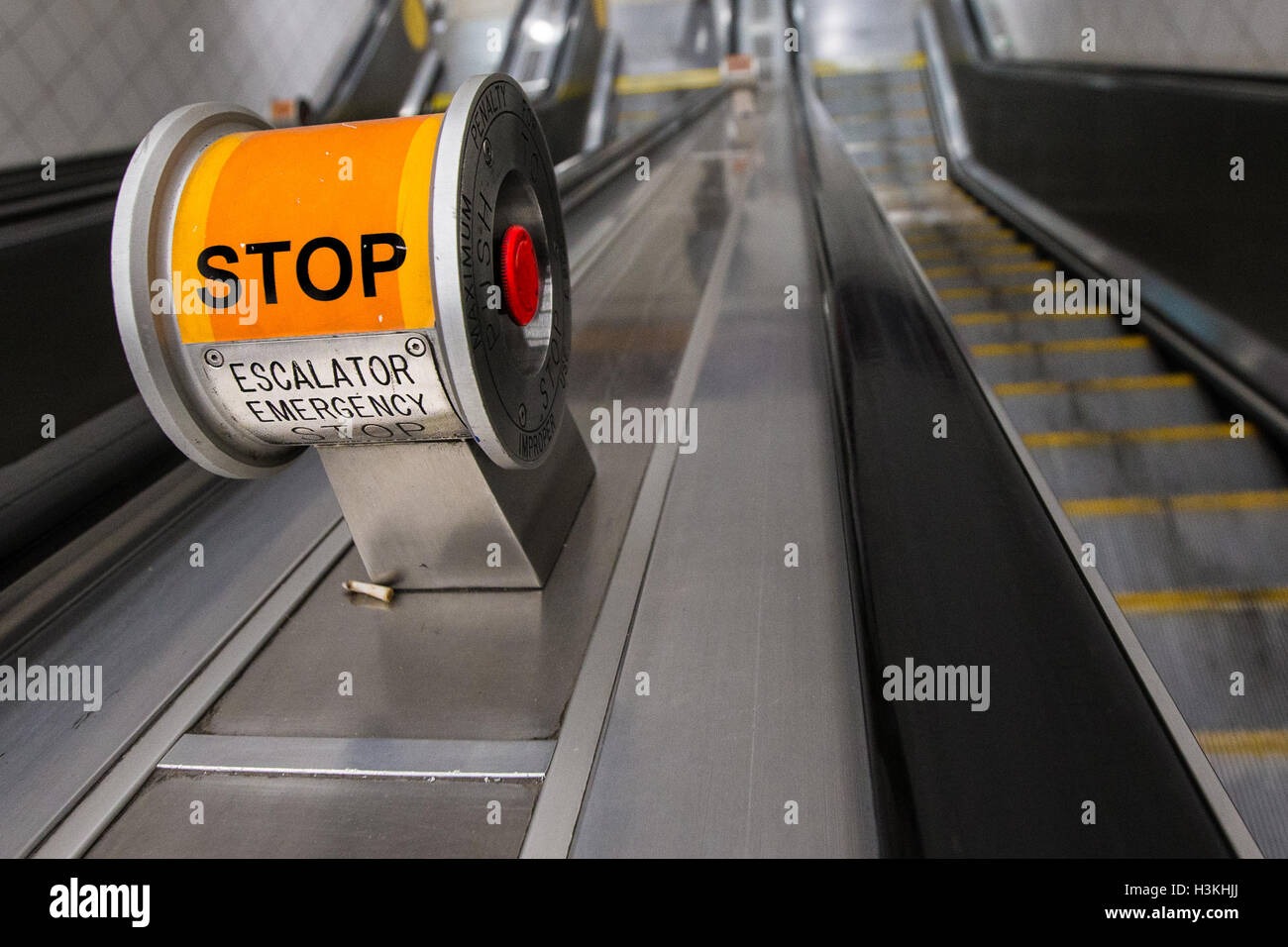 Emergency stop button London underground tube station escalator Stock ...