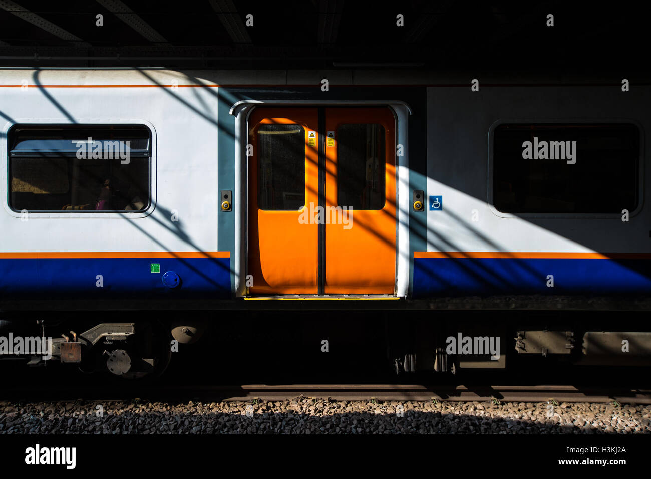 London Overground Train waiting at Clapton Station Stock Photo - Alamy