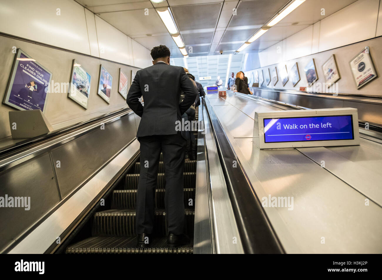 Escalator London Underground Walk on the left Stock Photo - Alamy