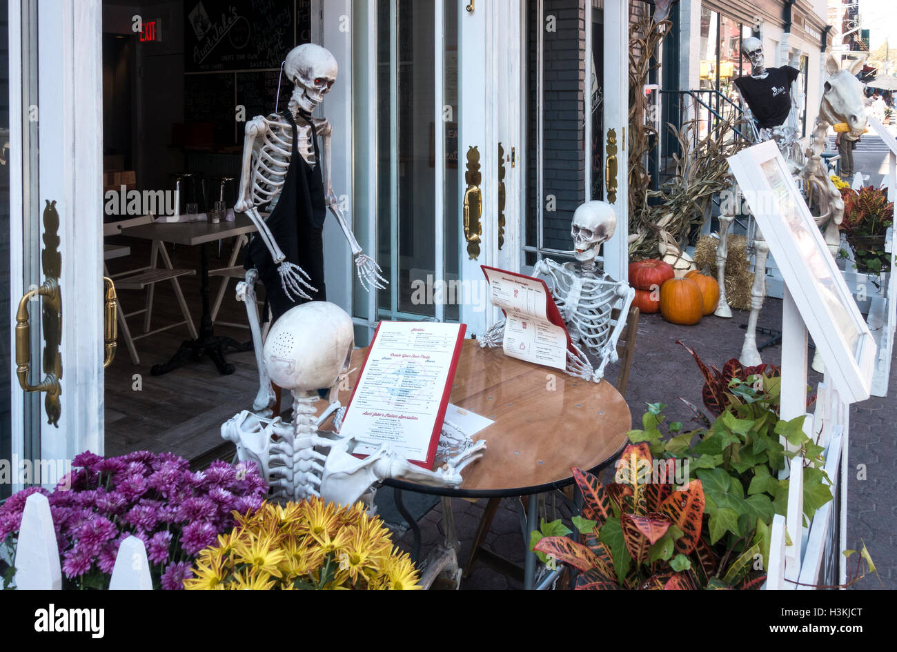 Halloween skeletons having lunch in a Little Italy restaurant in New ...