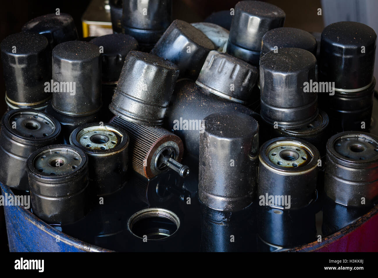 Automobile oil filters background Stock Photo - Alamy
