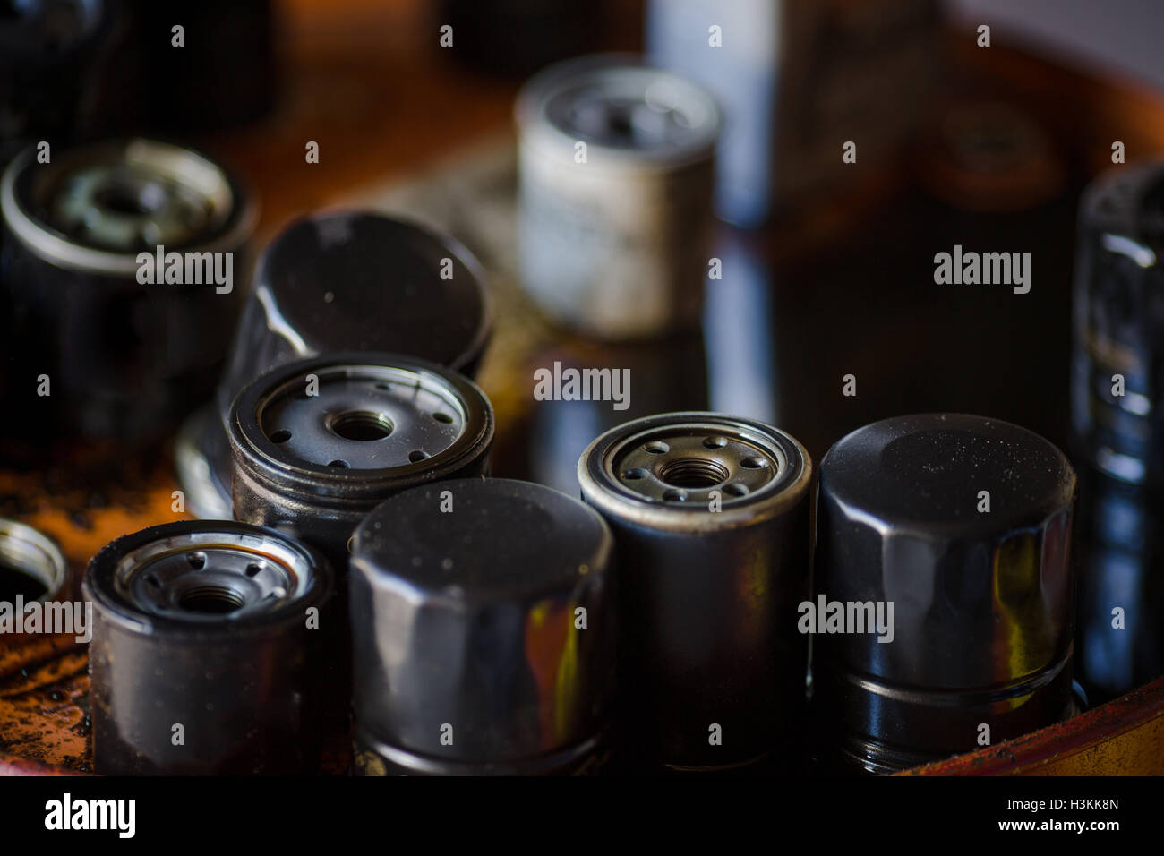Automobile oil filters background Stock Photo - Alamy