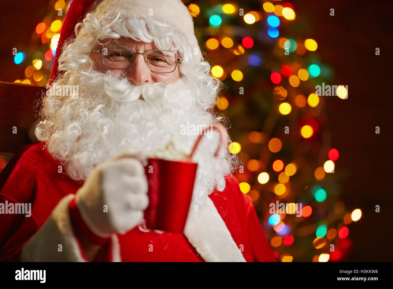 Santa Claus with drink Stock Photo - Alamy
