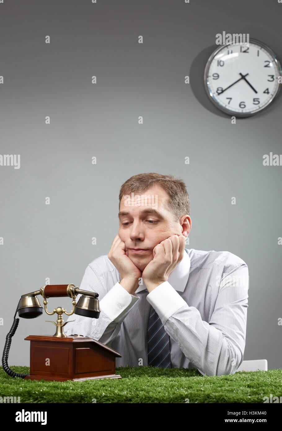 Expecting a call Stock Photo - Alamy