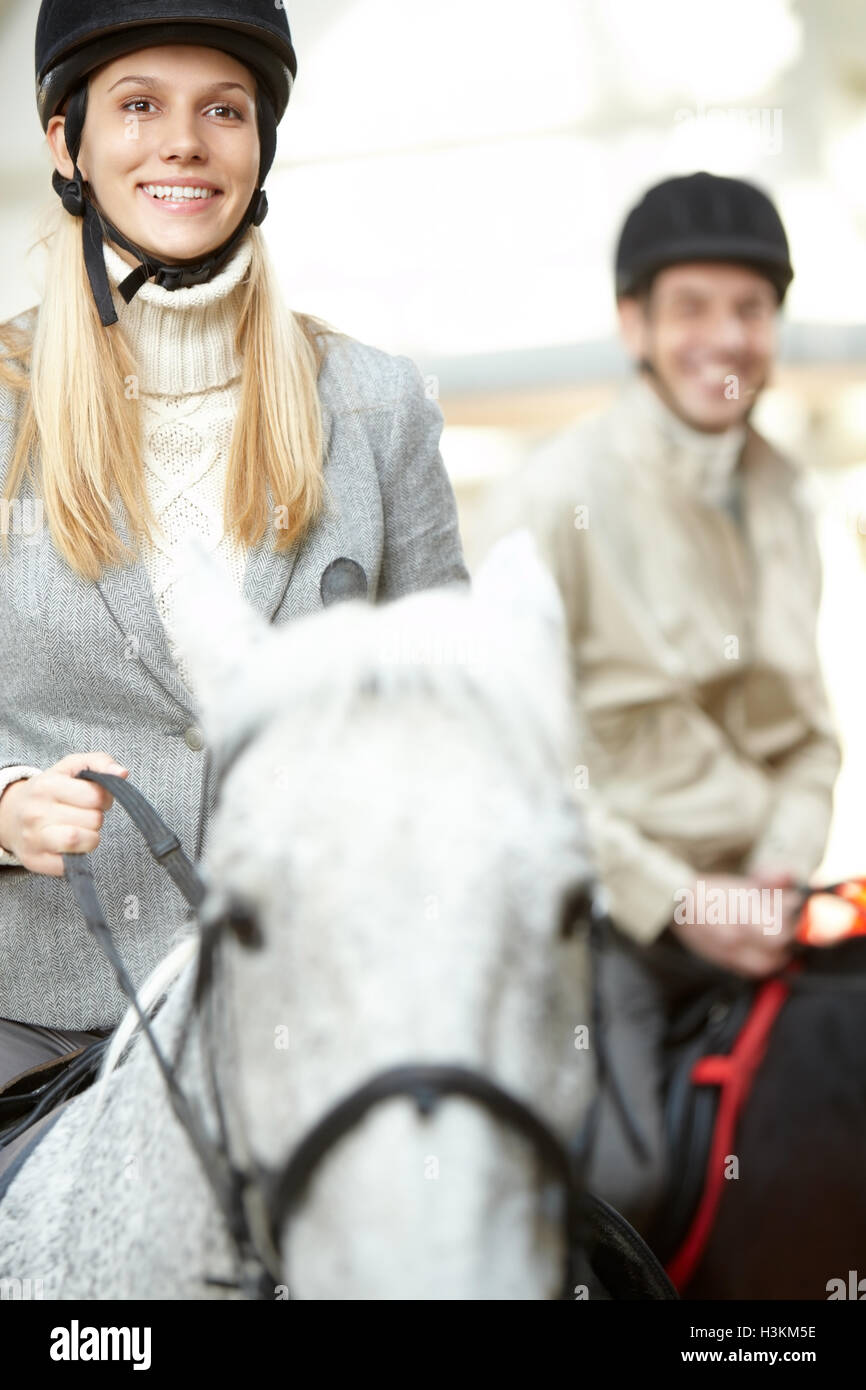 Woman jockey learning riding horse hi-res stock photography and images ...