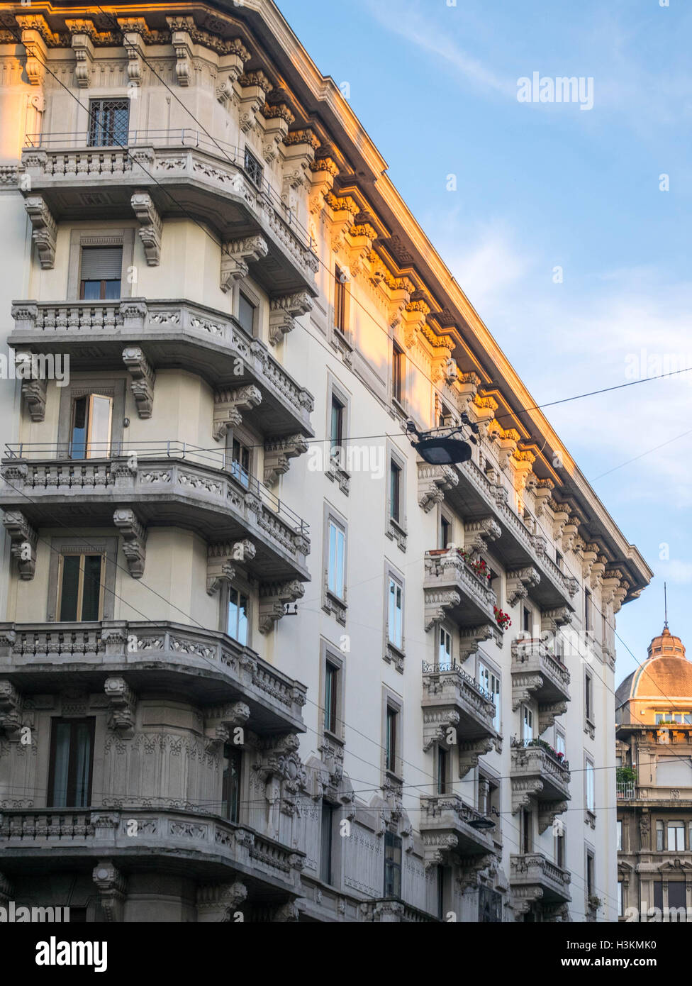 Old stylish luxury buildings in Milan Italy during early morning during ...