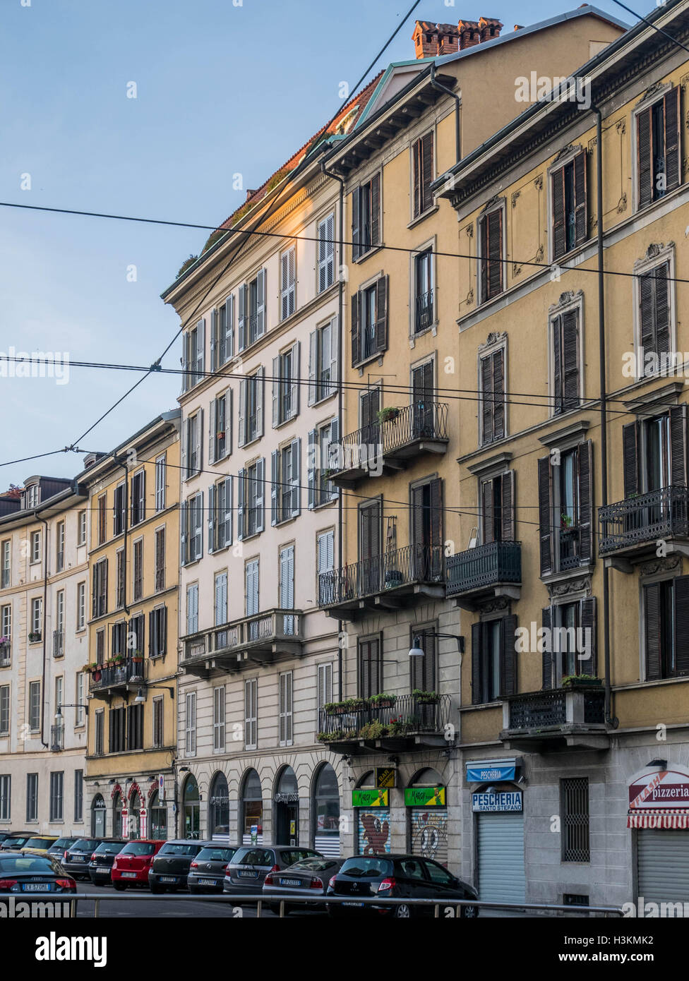 Old stylish luxury buildings in Milan Italy during early morning during ...