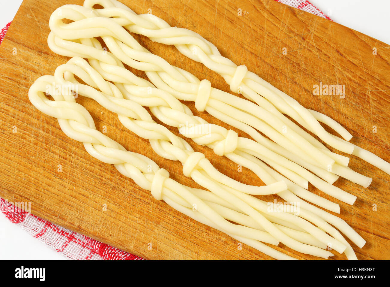String cheese in the shape of little braids (Korbaciky Stock Photo - Alamy