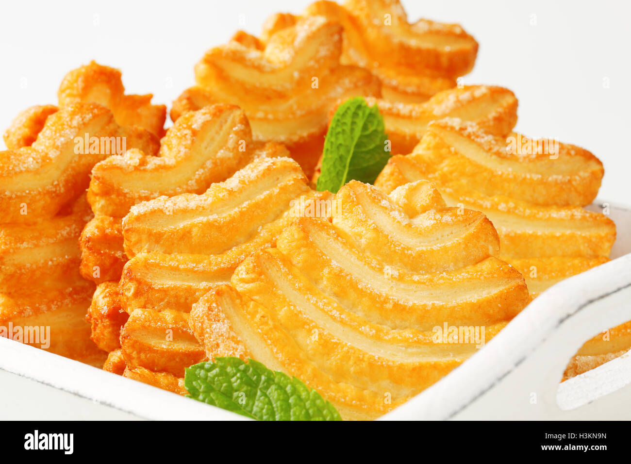 Italian puff pastry cookies coated with sugar Stock Photo - Alamy