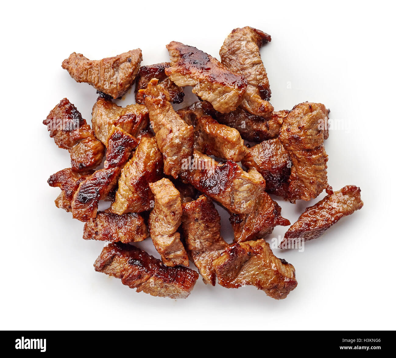 Grilled beef chunks isolated on white background, top view Stock Photo ...