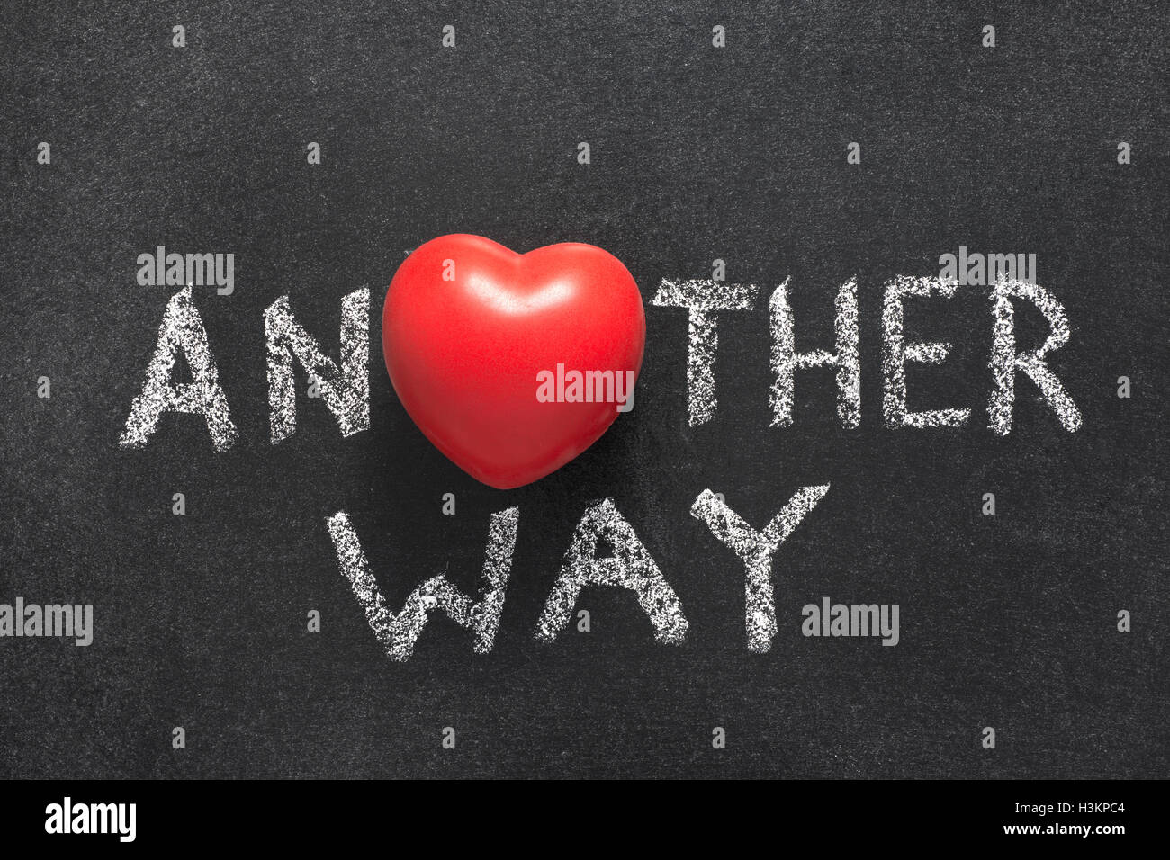 another way phrase handwritten on blackboard with heart symbol instead ...