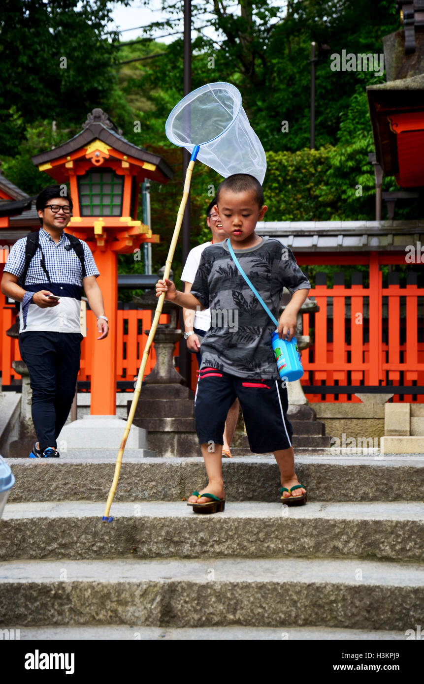 Japanese children people holding Insect net or Swing fishing nets and ...