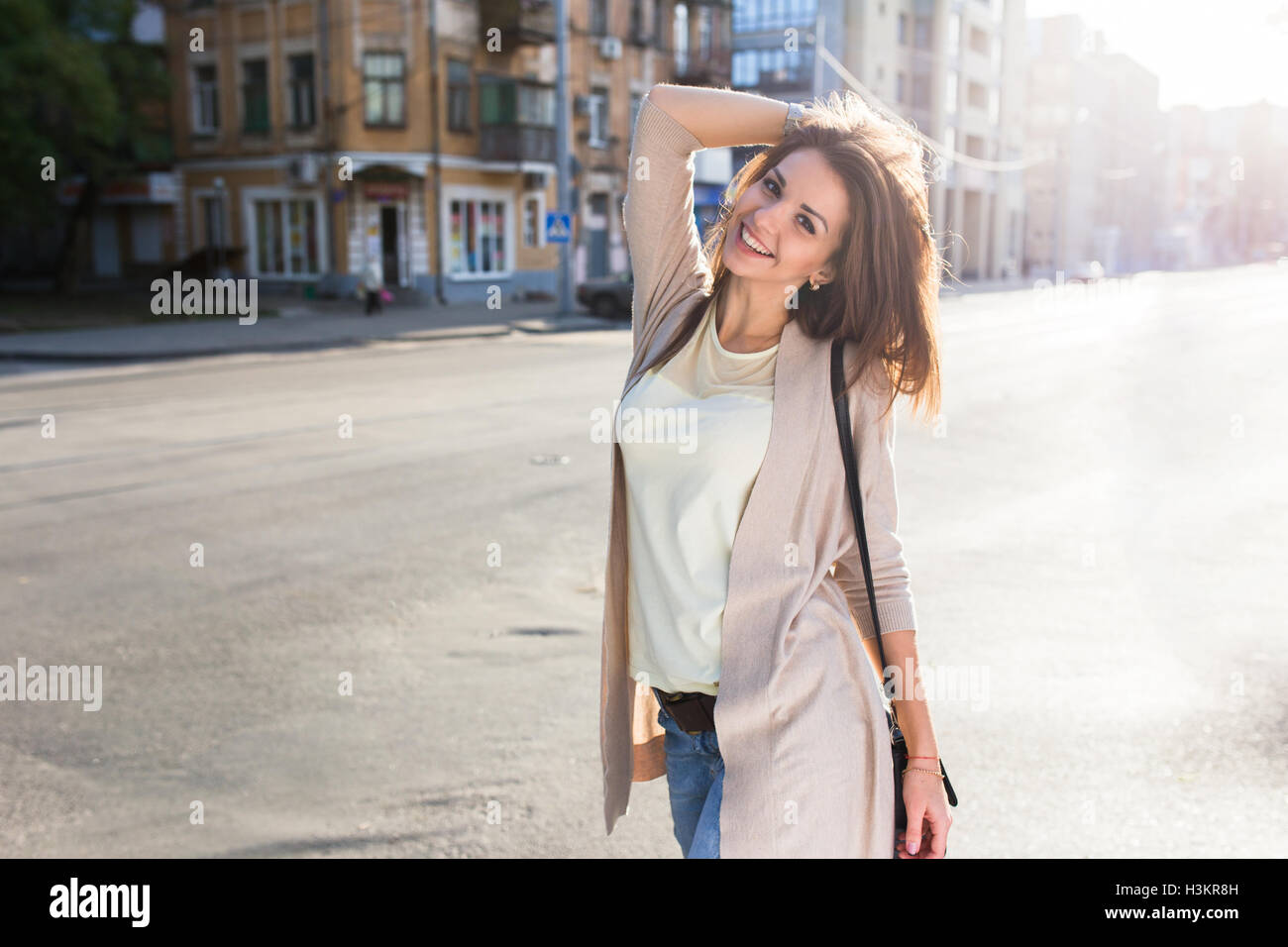 Portrait of beauty woman with perfect smile walking on the street and ...