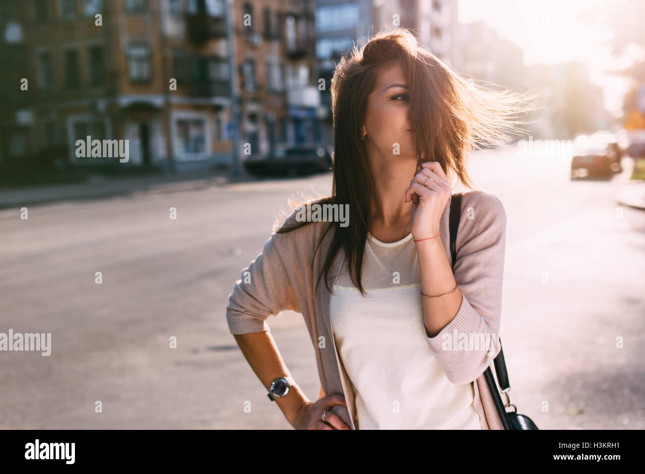 Portrait of beauty woman with perfect smile walking on the street and ...